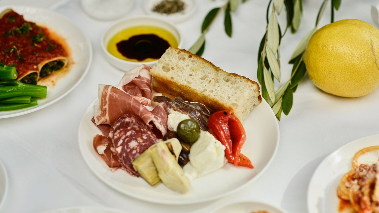 Qantas unveils Business dining onboard Perth-Rome flights - Point Hacks