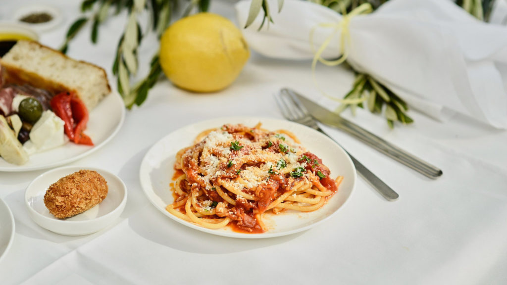 Qantas unveils Business dining onboard Perth-Rome flights - Point Hacks