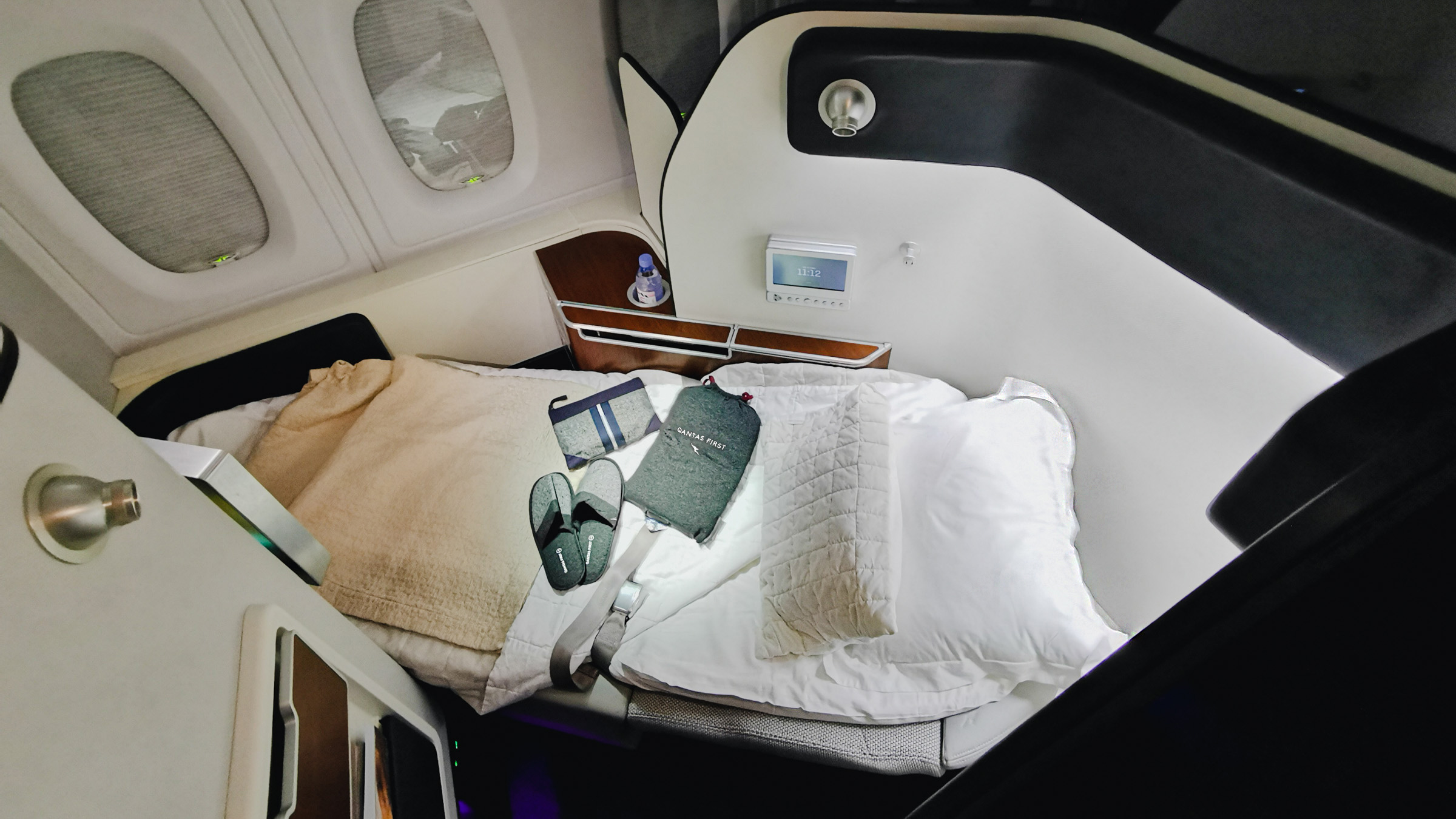 Experience the indulgence of Qantas First for under $300 - Point Hacks